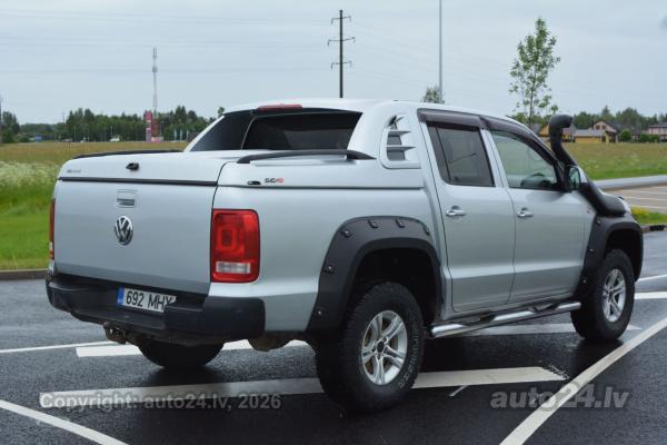 Grey Volkswagen Amarok 2011 in Parnu, with an engine capacity of 2.00 L and mileage of 334 thousand km for 12400 €, photo 4 on AUTOMOTO.COM.LV