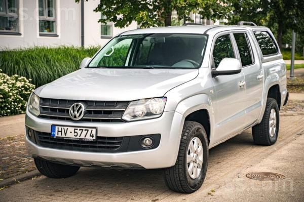 Grey Volkswagen Amarok 2012 in Riga, with an engine capacity of 2.00 L and mileage of 250 thousand km for 5990 €, photo 1 on AUTOMOTO.COM.LV