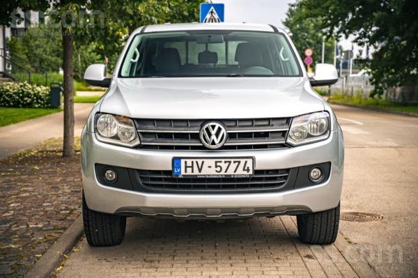 Grey Volkswagen Amarok 2012 in Riga, with an engine capacity of 2.00 L and mileage of 250 thousand km for 5990 €, photo 2 on AUTOMOTO.COM.LV