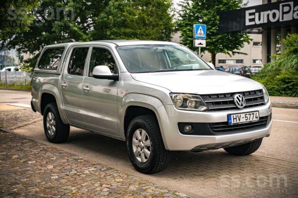 Grey Volkswagen Amarok 2012 in Riga, with an engine capacity of 2.00 L and mileage of 250 thousand km for 5990 €, photo 3 on AUTOMOTO.COM.LV