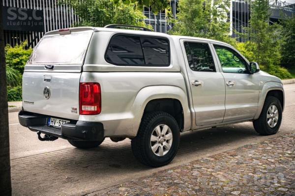 Grey Volkswagen Amarok 2012 in Riga, with an engine capacity of 2.00 L and mileage of 250 thousand km for 5990 €, photo 4 on AUTOMOTO.COM.LV