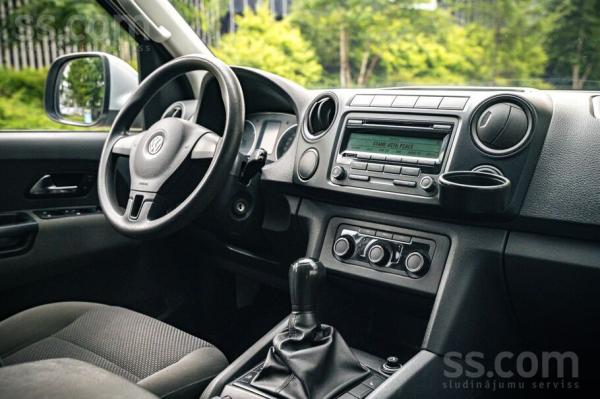 Grey Volkswagen Amarok 2012 in Riga, with an engine capacity of 2.00 L and mileage of 250 thousand km for 5990 €, photo 7 on AUTOMOTO.COM.LV