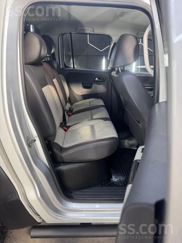 Grey Volkswagen Amarok 2014 in Jelgava, with an engine capacity of 2.00 L and mileage of 288 thousand km for 14500 €, photo 7 on AUTOMOTO.COM.LV