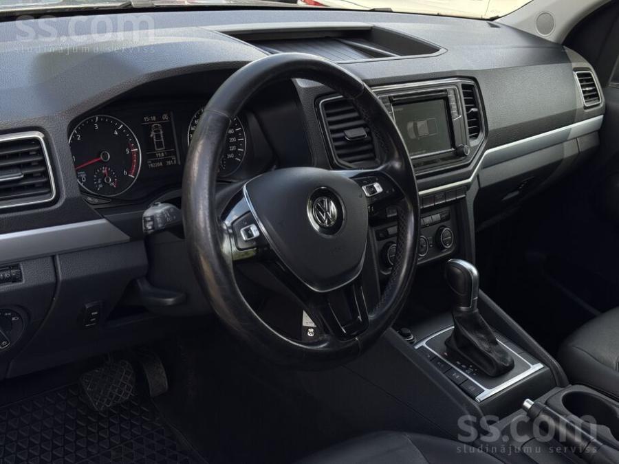 Grey Volkswagen Amarok 2017 in Valmiera, with an engine capacity of 3.00 L and mileage of 192 thousand km for 24900 €, photo 9 on AUTOMOTO.COM.LV