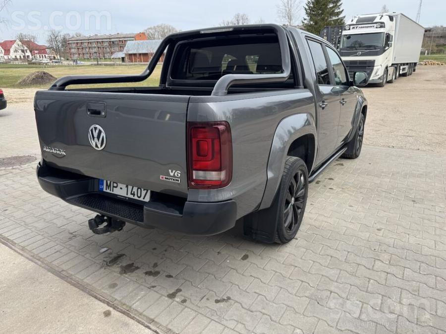 Grey Volkswagen Amarok 2020 in Aluksne, with an engine capacity of 3.00 L and mileage of 166 thousand km for 30000 €, photo 4 on AUTOMOTO.COM.LV