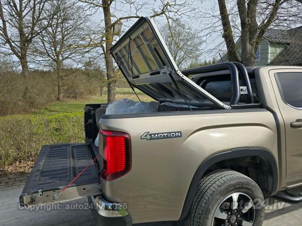 Pelēks Volkswagen Amarok 2023 Tallina, ar dzinēja tilpumu 3.00 L un nobraukumu 15 tūkst. km par 42500 €, foto 5 vietnē AUTOMOTO.COM.LV