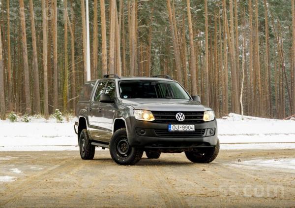 Grey Volkswagen Amarok 2011 in Riga, with an engine capacity of 2.00 L and mileage of 242 thousand km for 13990 €, photo 2 on AUTOMOTO.COM.LV