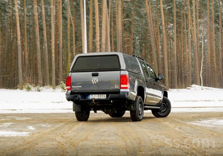 Grey Volkswagen Amarok 2011 in Riga, with an engine capacity of 2.00 L and mileage of 242 thousand km for 13990 €, photo 5 on AUTOMOTO.COM.LV