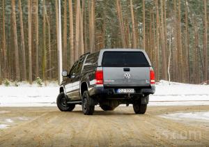 Grey Volkswagen Amarok 2011 in Riga, with an engine capacity of 2.00 L and mileage of 242 thousand km for 13990 €, photo 7 on AUTOMOTO.COM.LV