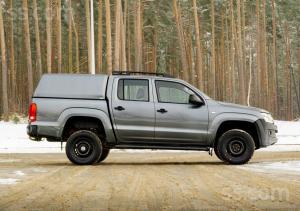 Grey Volkswagen Amarok 2011 in Riga, with an engine capacity of 2.00 L and mileage of 242 thousand km for 13990 €, photo 8 on AUTOMOTO.COM.LV