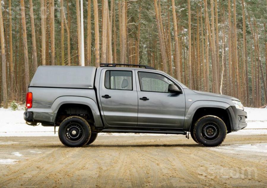 Grey Volkswagen Amarok 2011 in Riga, with an engine capacity of 2.00 L and mileage of 242 thousand km for 13990 €, photo 8 on AUTOMOTO.COM.LV