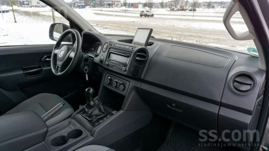 Grey Volkswagen Amarok 2011 in Riga, with an engine capacity of 2.00 L and mileage of 242 thousand km for 13990 €, photo 10 on AUTOMOTO.COM.LV