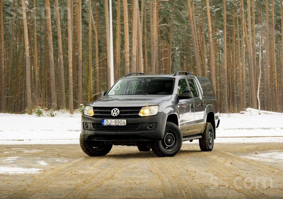 Grey Volkswagen Amarok 2011 in Riga, with an engine capacity of 2.00 L and mileage of 242 thousand km for 12990 €, photo 4 on AUTOMOTO.COM.LV