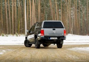 Grey Volkswagen Amarok 2011 in Riga, with an engine capacity of 2.00 L and mileage of 242 thousand km for 12990 €, photo 8 on AUTOMOTO.COM.LV