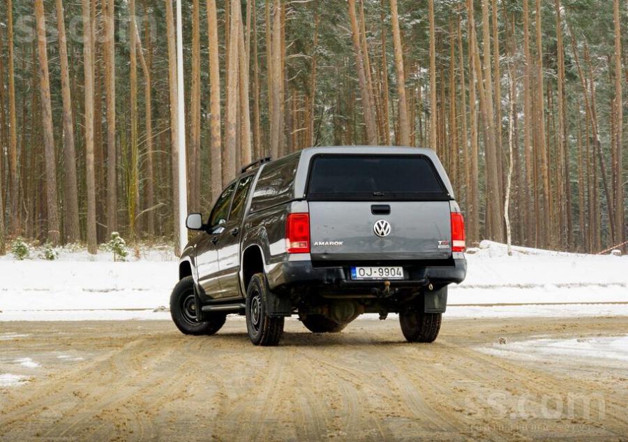 Grey Volkswagen Amarok 2011 in Riga, with an engine capacity of 2.00 L and mileage of 242 thousand km for 12990 €, photo 8 on AUTOMOTO.COM.LV