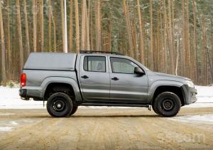 Grey Volkswagen Amarok 2011 in Riga, with an engine capacity of 2.00 L and mileage of 242 thousand km for 12990 €, photo 9 on AUTOMOTO.COM.LV