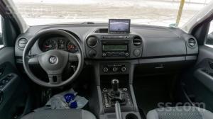 Grey Volkswagen Amarok 2011 in Riga, with an engine capacity of 2.00 L and mileage of 242 thousand km for 12990 €, photo 12 on AUTOMOTO.COM.LV