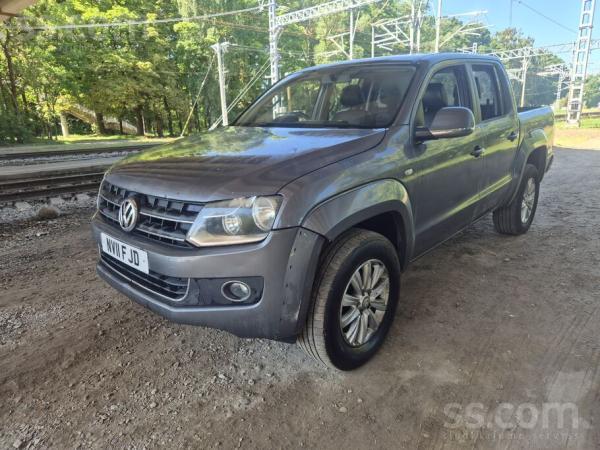Grey Volkswagen Amarok 2011 in Riga, with an engine capacity of 2.00 L and mileage of 435 thousand km for 4200 €, photo 3 on AUTOMOTO.COM.LV