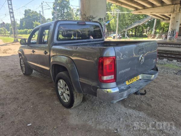 Grey Volkswagen Amarok 2011 in Riga, with an engine capacity of 2.00 L and mileage of 435 thousand km for 4200 €, photo 4 on AUTOMOTO.COM.LV