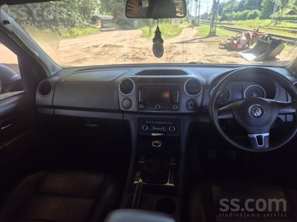 Grey Volkswagen Amarok 2011 in Riga, with an engine capacity of 2.00 L and mileage of 435 thousand km for 4200 €, photo 6 on AUTOMOTO.COM.LV