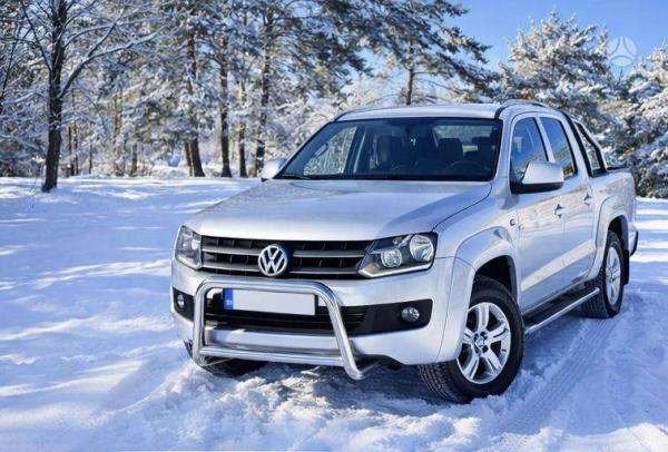 Grey Volkswagen Amarok 2012 in Vilnius, with an engine capacity of 1.97 L and mileage of 409 thousand km for 9700 €, photo 3 on AUTOMOTO.COM.LV