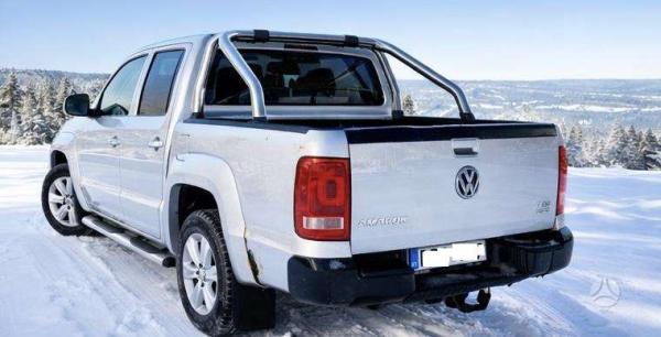 Grey Volkswagen Amarok 2012 in Vilnius, with an engine capacity of 1.97 L and mileage of 409 thousand km for 9700 €, photo 4 on AUTOMOTO.COM.LV