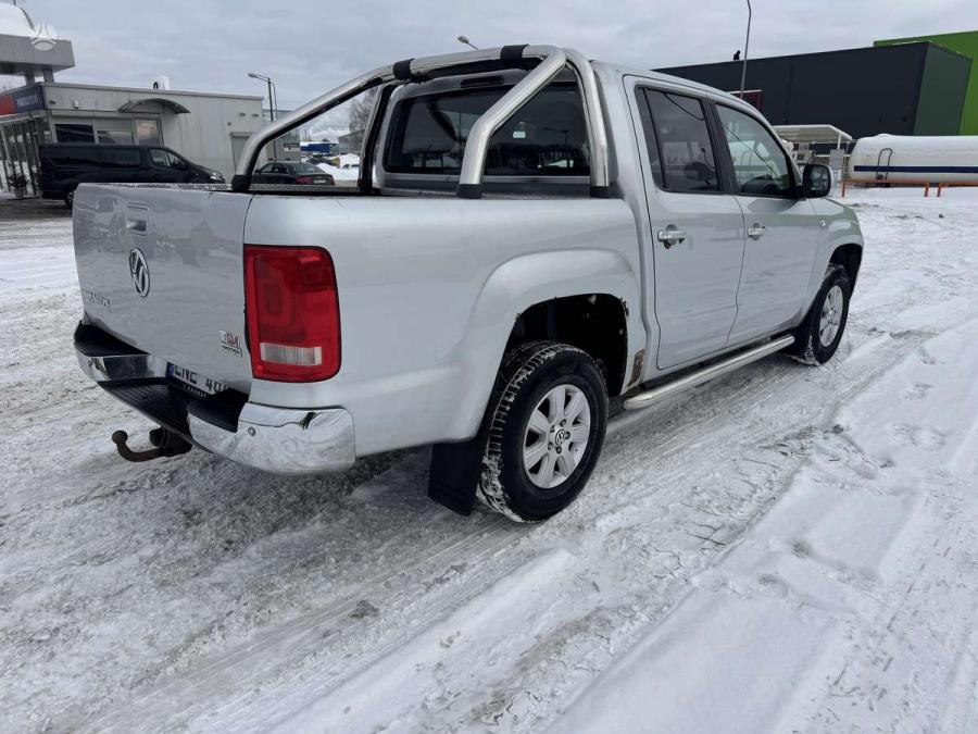 Grey Volkswagen Amarok 2012 in Kaunas, with an engine capacity of 1.97 L and mileage of 399 thousand km for 7500 €, photo 7 on AUTOMOTO.COM.LV