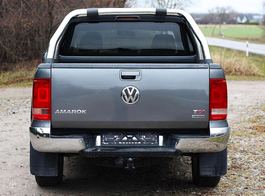 Grey Volkswagen Amarok 2013 in Kretinga, with an engine capacity of 1.97 L and mileage of 307 thousand km for 11999 €, photo 11 on AUTOMOTO.COM.LV