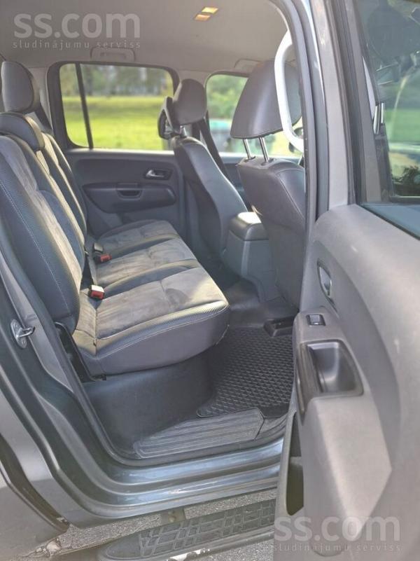 Grey Volkswagen Amarok 2014 in Riga, with an engine capacity of 2.00 L and mileage of 241 thousand km for 14900 €, photo 5 on AUTOMOTO.COM.LV