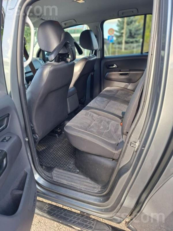 Grey Volkswagen Amarok 2014 in Riga, with an engine capacity of 2.00 L and mileage of 241 thousand km for 14900 €, photo 6 on AUTOMOTO.COM.LV