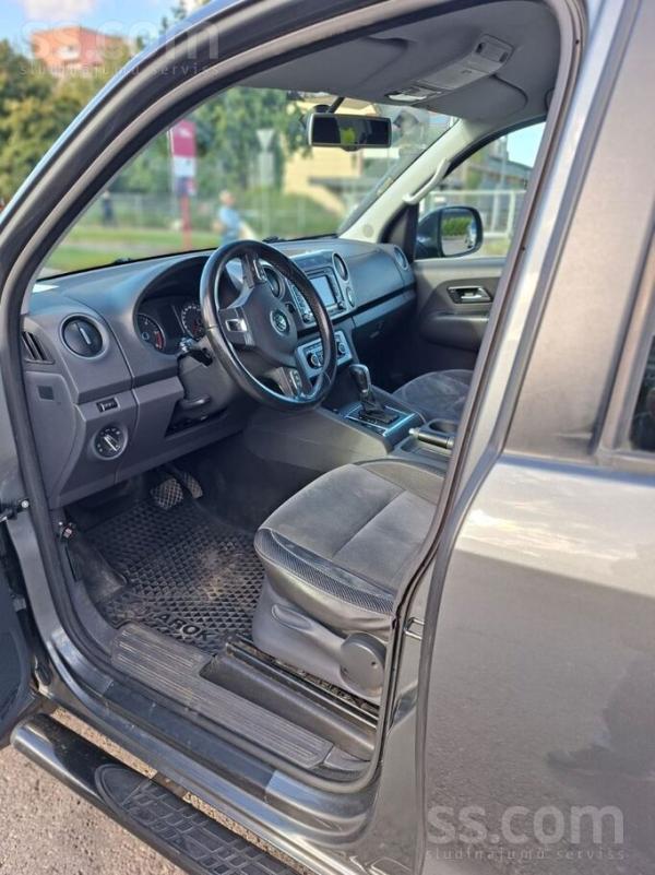 Grey Volkswagen Amarok 2014 in Riga, with an engine capacity of 2.00 L and mileage of 241 thousand km for 14900 €, photo 7 on AUTOMOTO.COM.LV