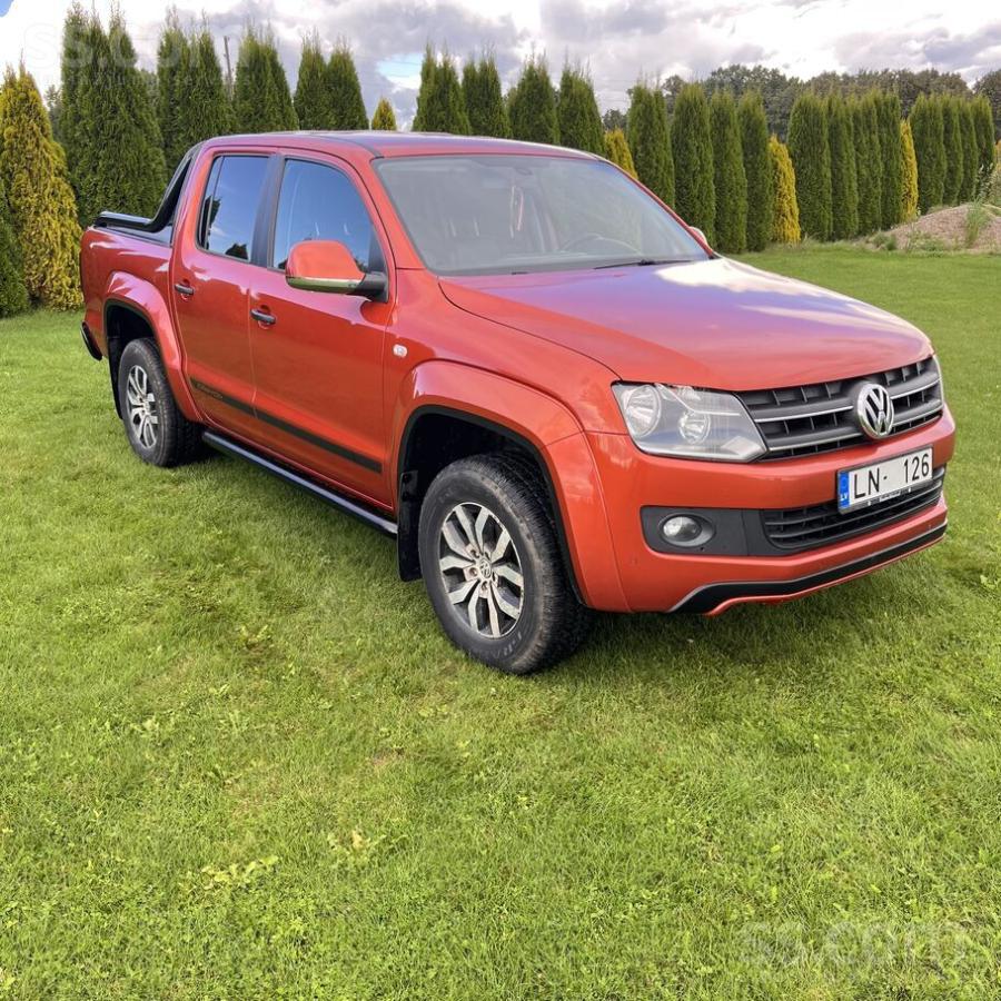 Orange Volkswagen Amarok 2014 in Bauska, with an engine capacity of 2.00 L and mileage of 245 thousand km for 11500 €, photo 4 on AUTOMOTO.COM.LV