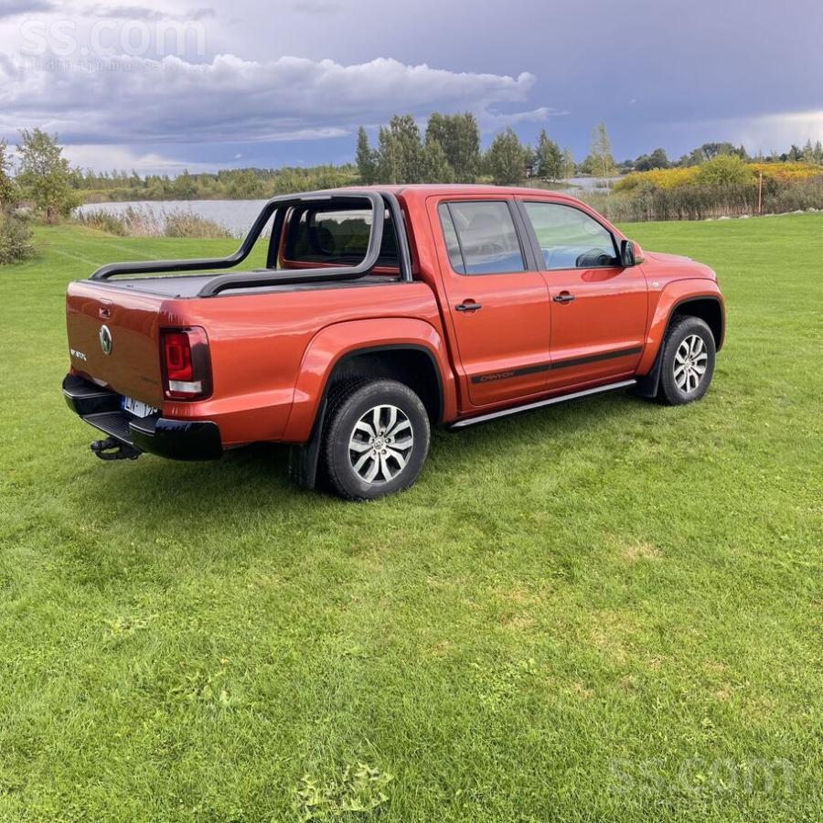Orange Volkswagen Amarok 2014 in Bauska, with an engine capacity of 2.00 L and mileage of 245 thousand km for 11500 €, photo 6 on AUTOMOTO.COM.LV