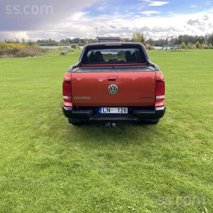 Orange Volkswagen Amarok 2014 in Bauska, with an engine capacity of 2.00 L and mileage of 245 thousand km for 11500 €, photo 7 on AUTOMOTO.COM.LV