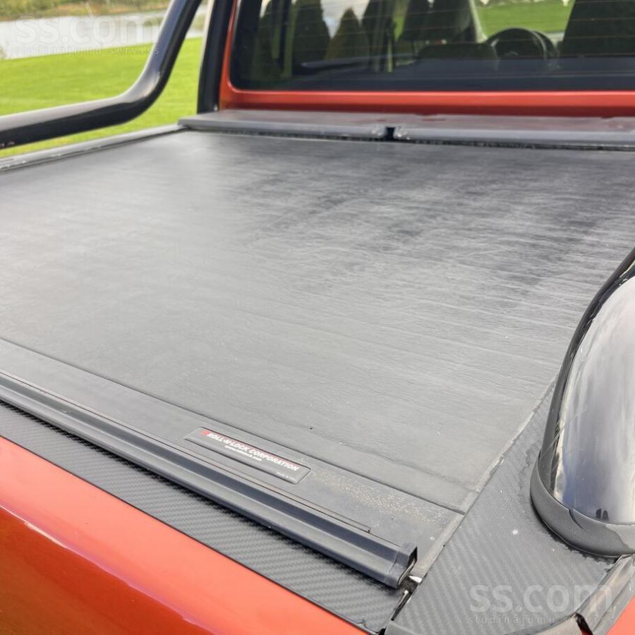 Orange Volkswagen Amarok 2014 in Bauska, with an engine capacity of 2.00 L and mileage of 245 thousand km for 11500 €, photo 8 on AUTOMOTO.COM.LV