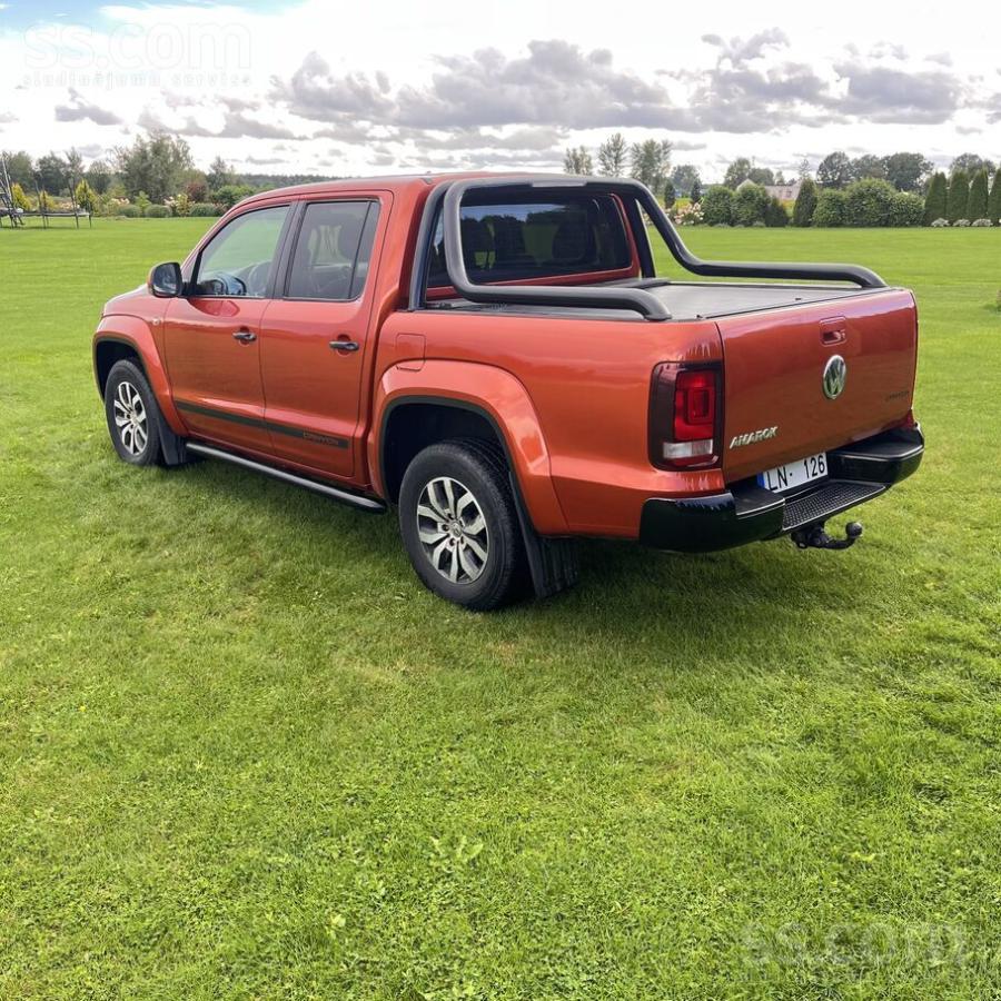 Orange Volkswagen Amarok 2014 in Bauska, with an engine capacity of 2.00 L and mileage of 245 thousand km for 11500 €, photo 10 on AUTOMOTO.COM.LV