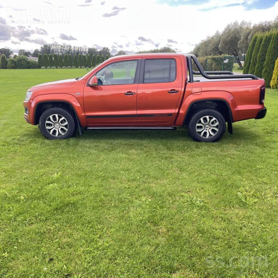 Orange Volkswagen Amarok 2014 in Bauska, with an engine capacity of 2.00 L and mileage of 245 thousand km for 11500 €, photo 11 on AUTOMOTO.COM.LV