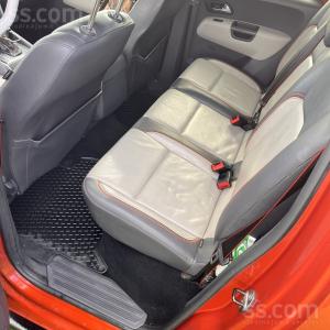 Orange Volkswagen Amarok 2014 in Bauska, with an engine capacity of 2.00 L and mileage of 245 thousand km for 11500 €, photo 16 on AUTOMOTO.COM.LV