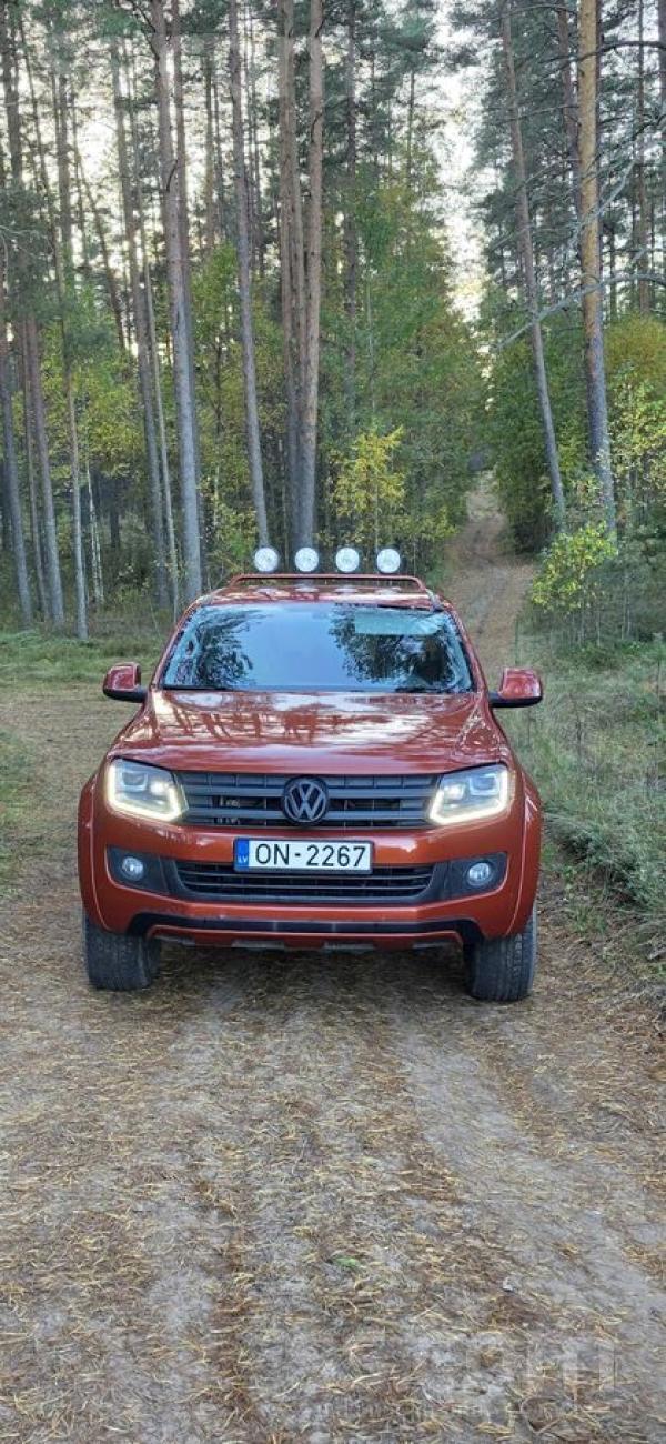 Volkswagen Amarok 2014 in Riga on AUTOMOTO.COM.LV Orange Volkswagen Amarok 2014 in Riga, with an engine capacity of 2.00 L and mileage of 219 thousand km for 14000 €, photo 3 on AUTOMOTO.COM.LV