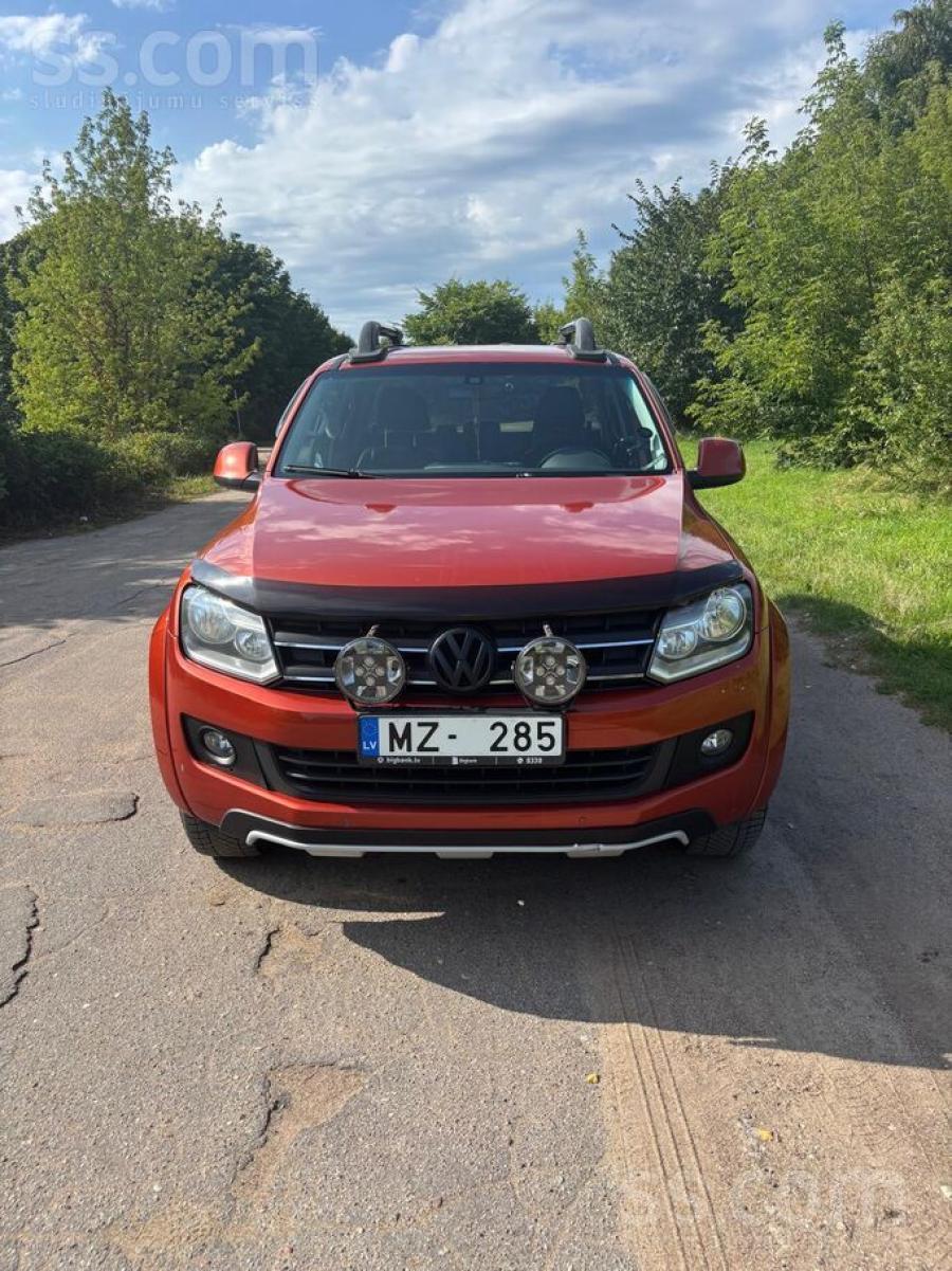 Orange Volkswagen Amarok 2014 in Riga, with an engine capacity of 2.00 L and mileage of 370 thousand km for 15000 €, photo 1 on AUTOMOTO.COM.LV