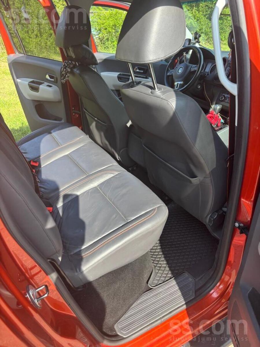 Orange Volkswagen Amarok 2014 in Riga, with an engine capacity of 2.00 L and mileage of 370 thousand km for 15000 €, photo 8 on AUTOMOTO.COM.LV