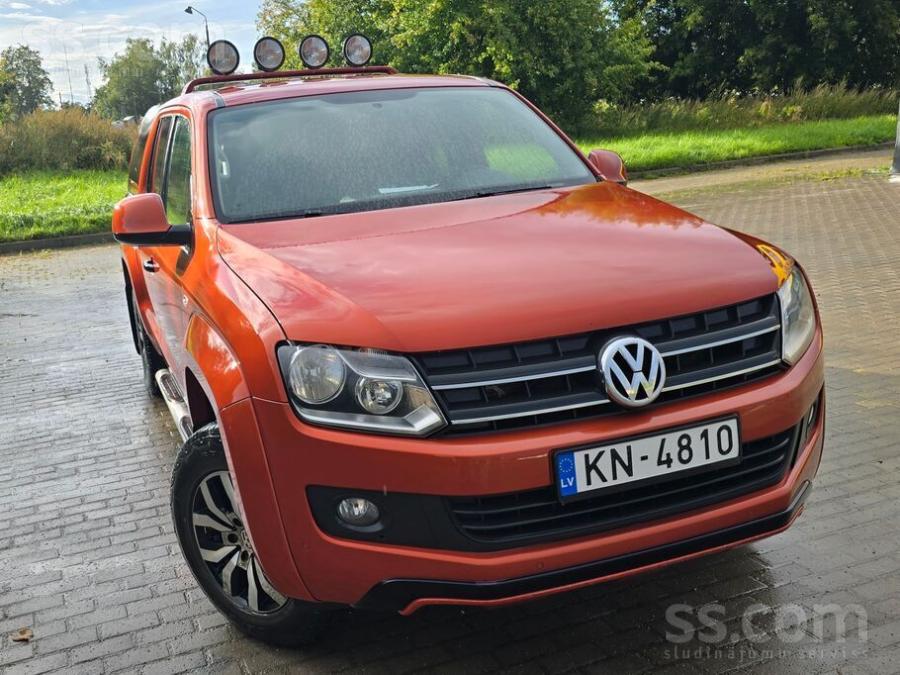 Orange Volkswagen Amarok 2014 in Jekabpils, with an engine capacity of 1.90 L and mileage of 327 thousand km for 13200 €, photo 1 on AUTOMOTO.COM.LV