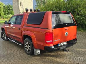 Orange Volkswagen Amarok 2014 in Jekabpils, with an engine capacity of 1.90 L and mileage of 327 thousand km for 13200 €, photo 5 on AUTOMOTO.COM.LV