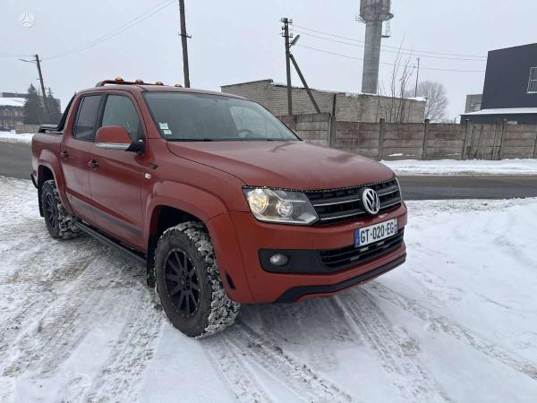 Orange Volkswagen Amarok 2015 in Taurage, with an engine capacity of 1.97 L and mileage of 232 thousand km for 14900 €, photo 1 on AUTOMOTO.COM.LV