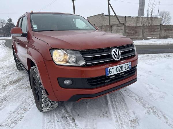 Orange Volkswagen Amarok 2015 in Taurage, with an engine capacity of 1.97 L and mileage of 232 thousand km for 14900 €, photo 3 on AUTOMOTO.COM.LV