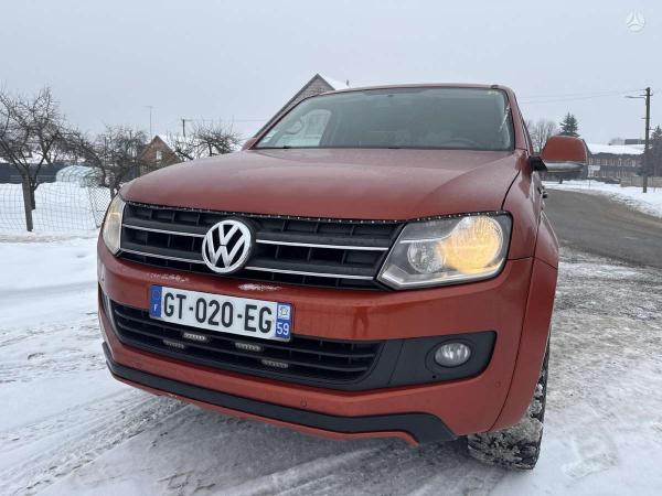 Orange Volkswagen Amarok 2015 in Taurage, with an engine capacity of 1.97 L and mileage of 232 thousand km for 14900 €, photo 4 on AUTOMOTO.COM.LV