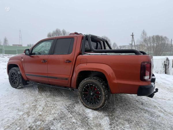 Orange Volkswagen Amarok 2015 in Taurage, with an engine capacity of 1.97 L and mileage of 232 thousand km for 14900 €, photo 6 on AUTOMOTO.COM.LV