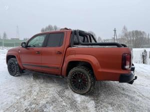Orange Volkswagen Amarok 2015 in Taurage, with an engine capacity of 1.97 L and mileage of 232 thousand km for 14900 €, photo 6 on AUTOMOTO.COM.LV