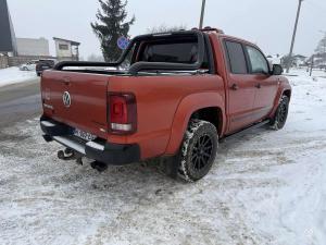 Orange Volkswagen Amarok 2015 in Taurage, with an engine capacity of 1.97 L and mileage of 232 thousand km for 14900 €, photo 7 on AUTOMOTO.COM.LV
