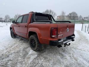 Orange Volkswagen Amarok 2015 in Taurage, with an engine capacity of 1.97 L and mileage of 232 thousand km for 14900 €, photo 8 on AUTOMOTO.COM.LV
